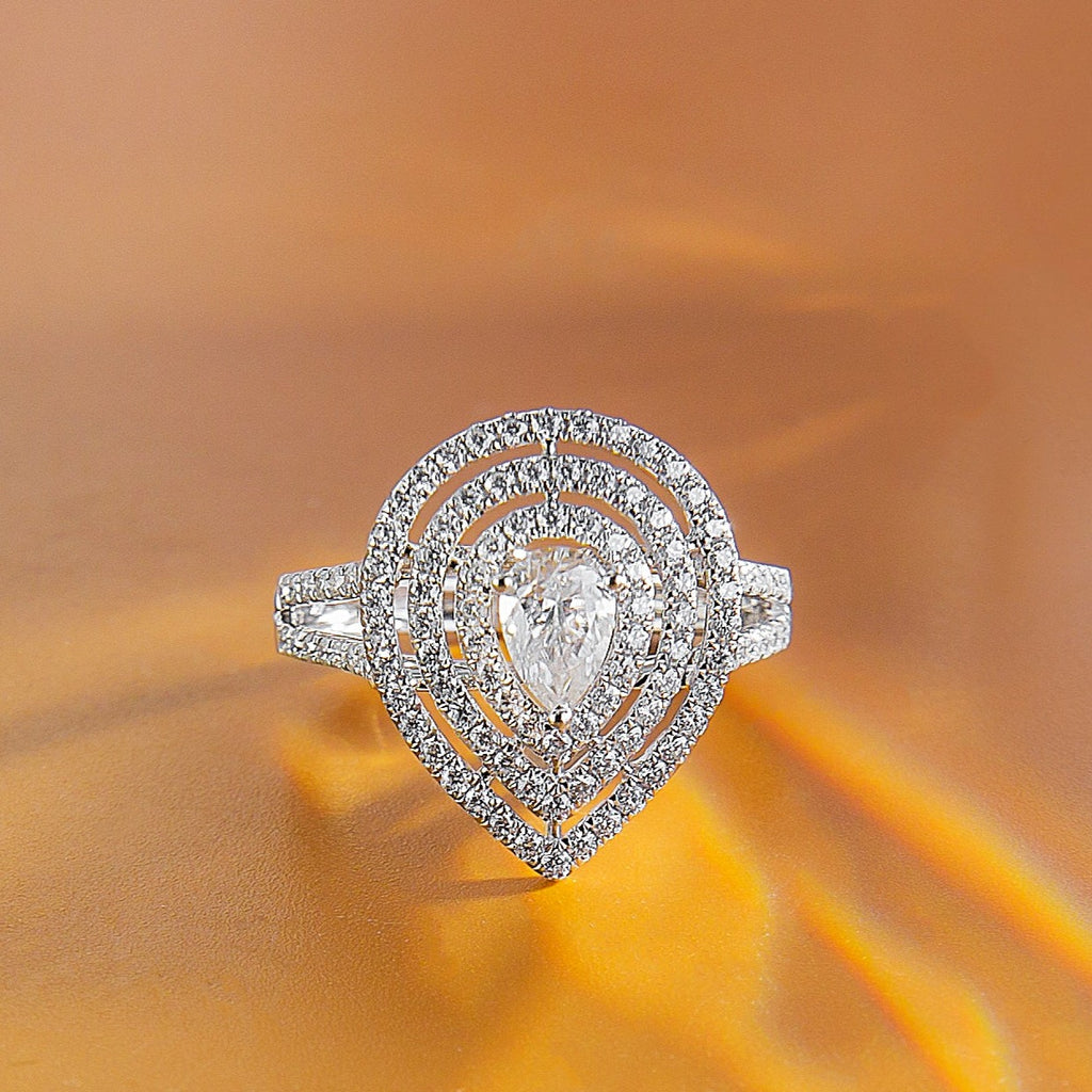 Violet Pear 18Karat White Gold Moissanite Engagement Ring – Saint Tracy